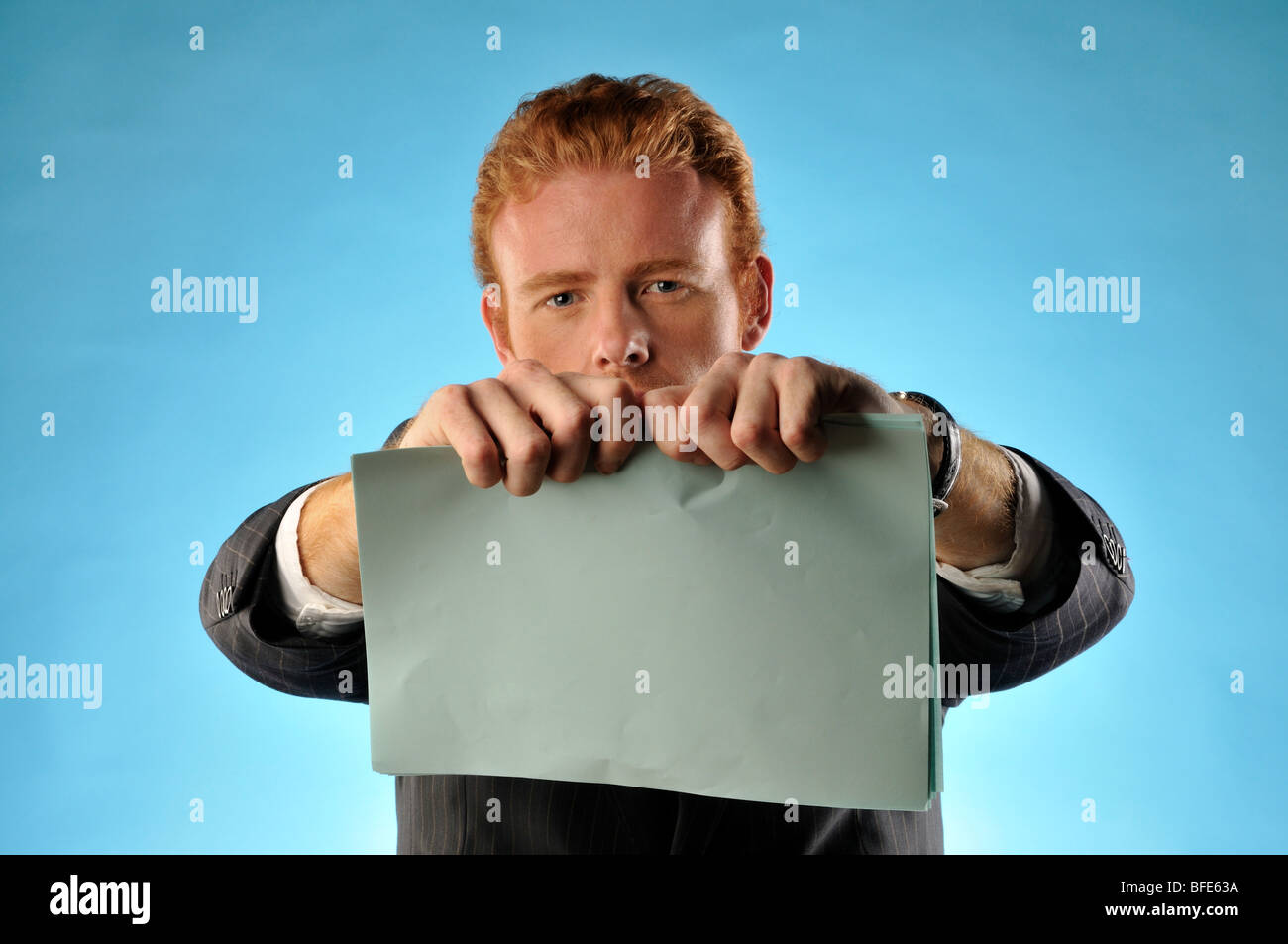 Male businessman tearing documents hi-res stock photography and images ...