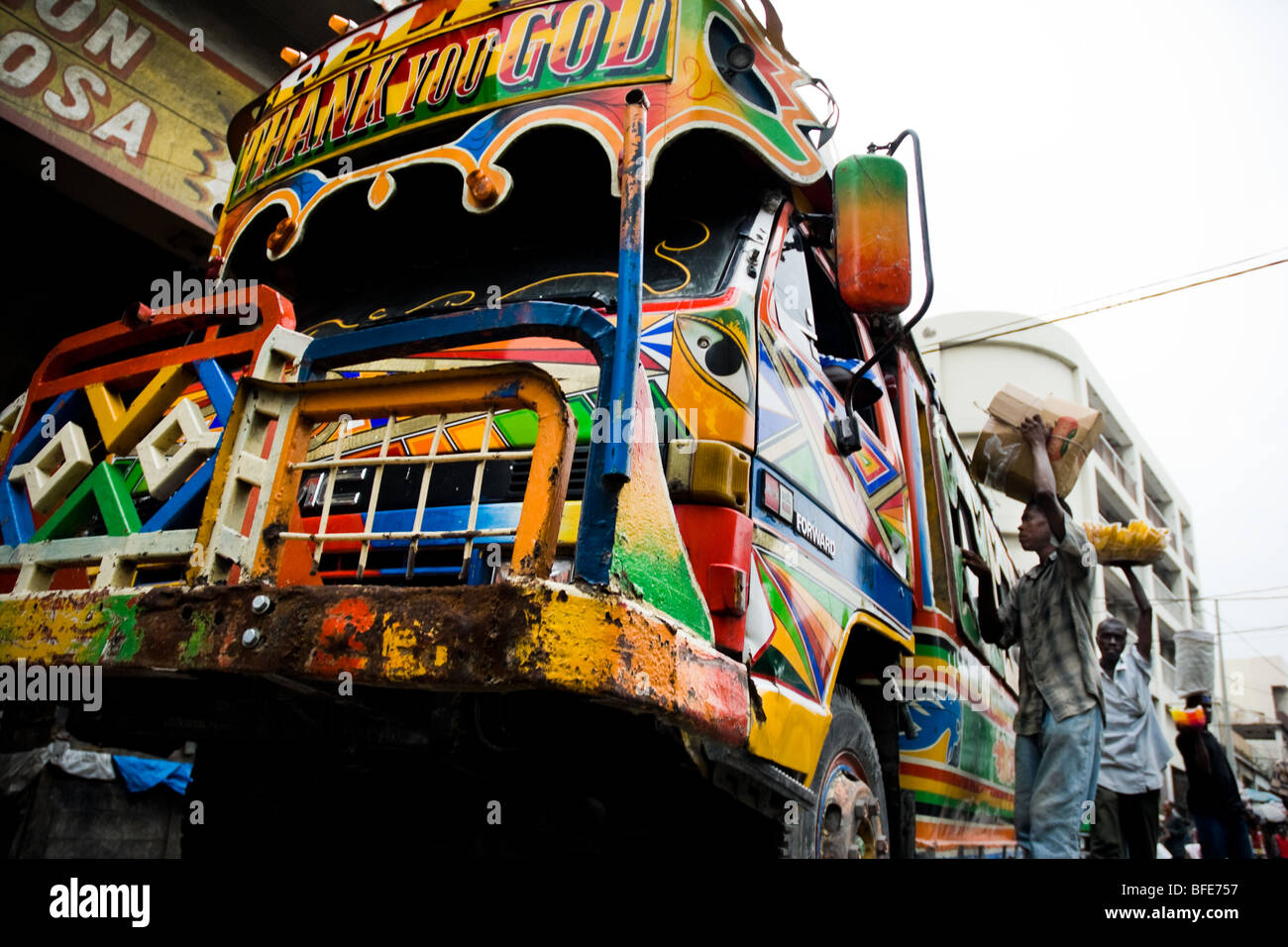 A tap-tap bus passing through the downtown of Port-au-Prince, Haiti ...