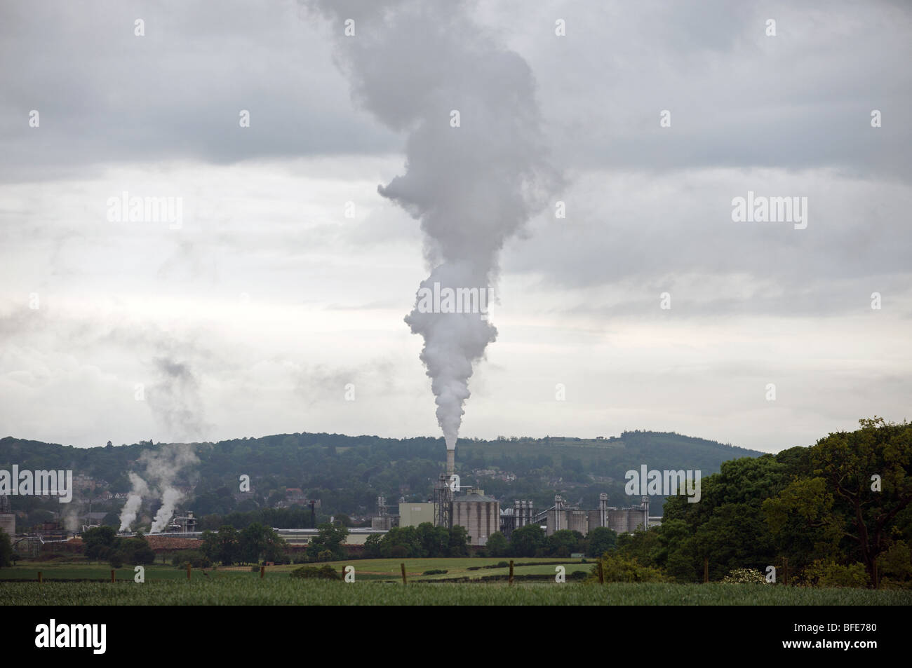 Smoke rising from a Chipboard factory in the English countryside Stock ...