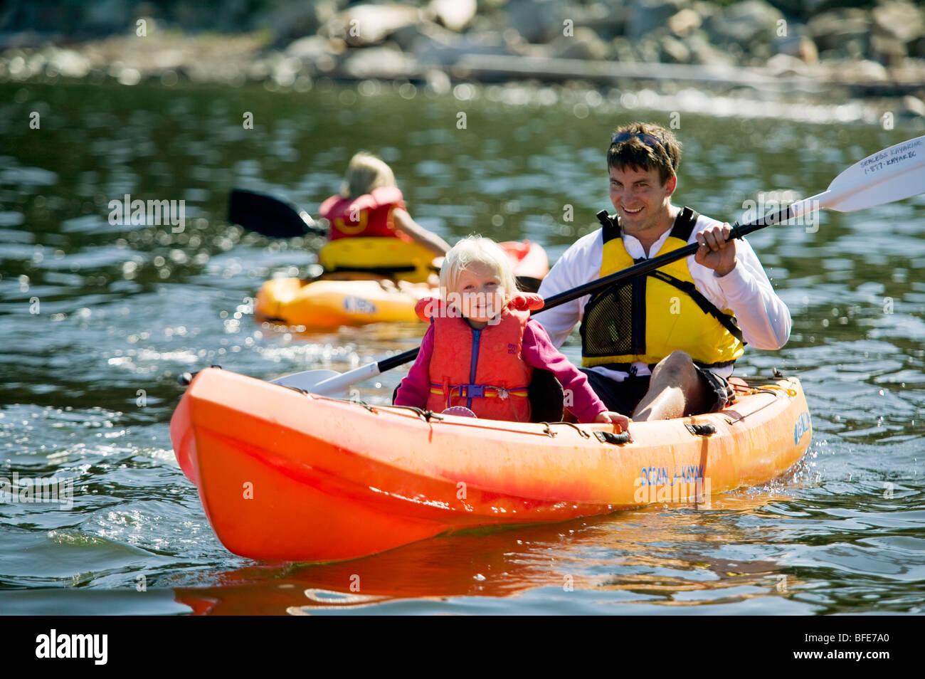 Father son paddling in kayak hi-res stock photography and images - Alamy