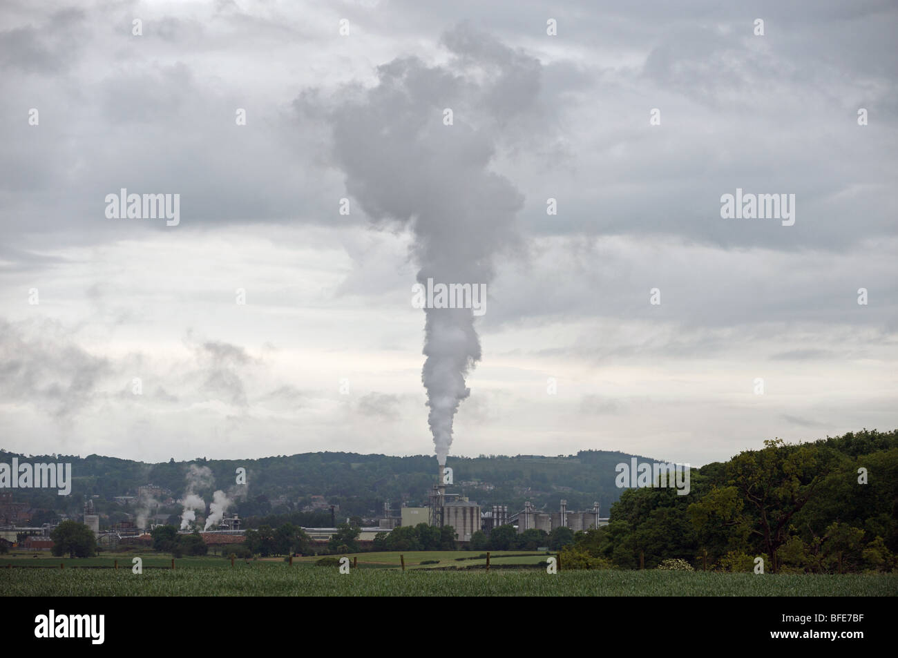 Smoke rising from a Chipboard factory in the English countryside Stock ...