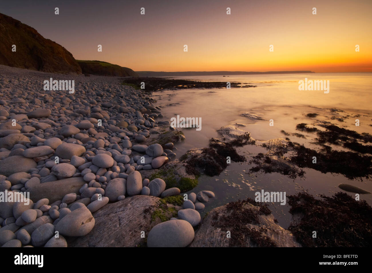 Sunset over Abbotsham beach on the North Devon coast UK Stock Photo - Alamy