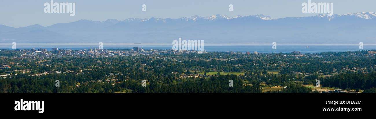 Panorama of the downtown core of Victoria Olympic Mountains in the ...
