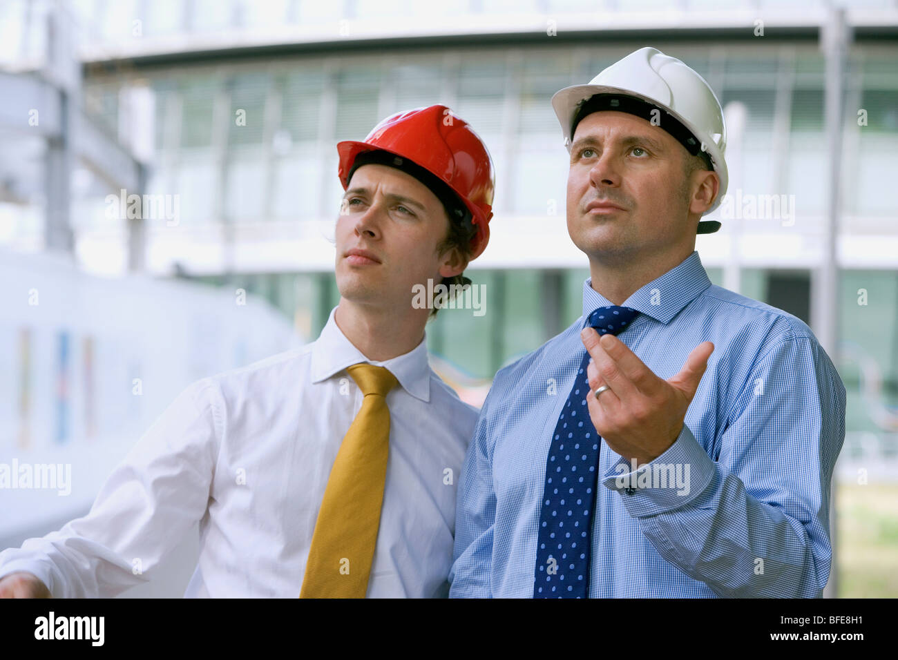 Teamwork. Construction managers Stock Photo - Alamy