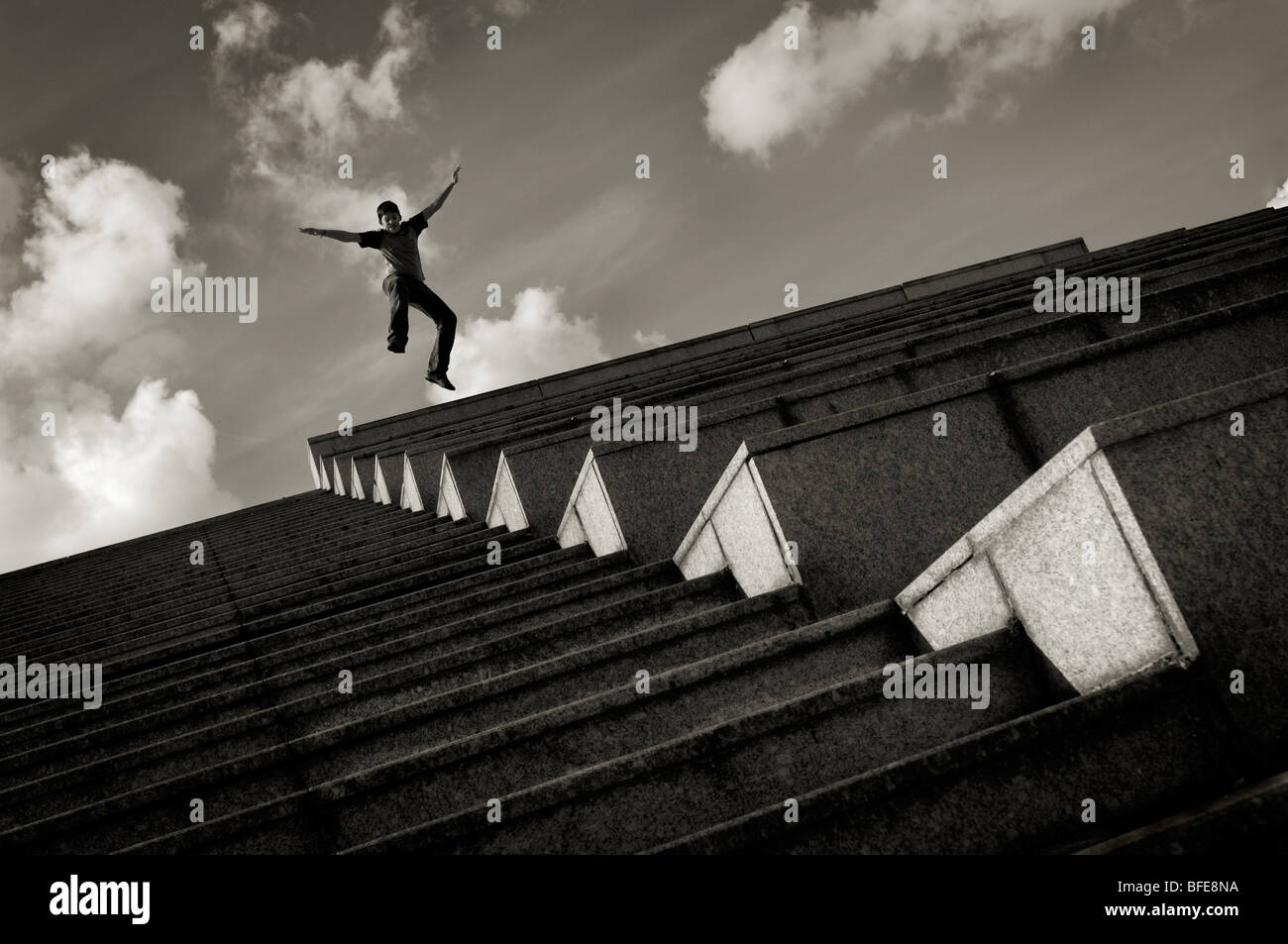 Man jumping on stairs hi-res stock photography and images - Alamy