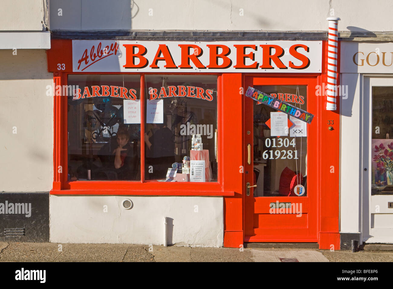 A Brightly Coloured Barber Shop Stock Photo - Alamy