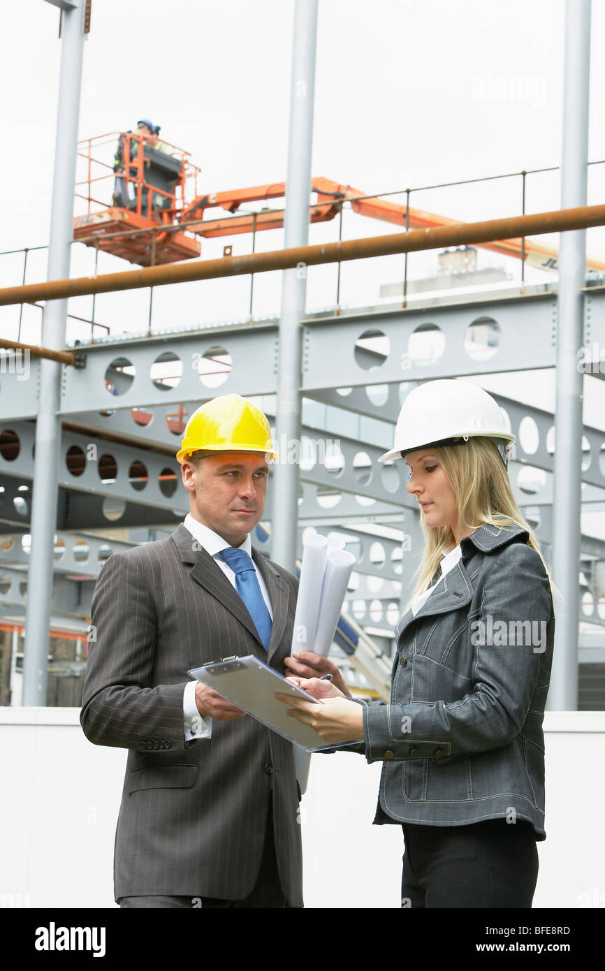 Construction managers on a building site Stock Photo - Alamy