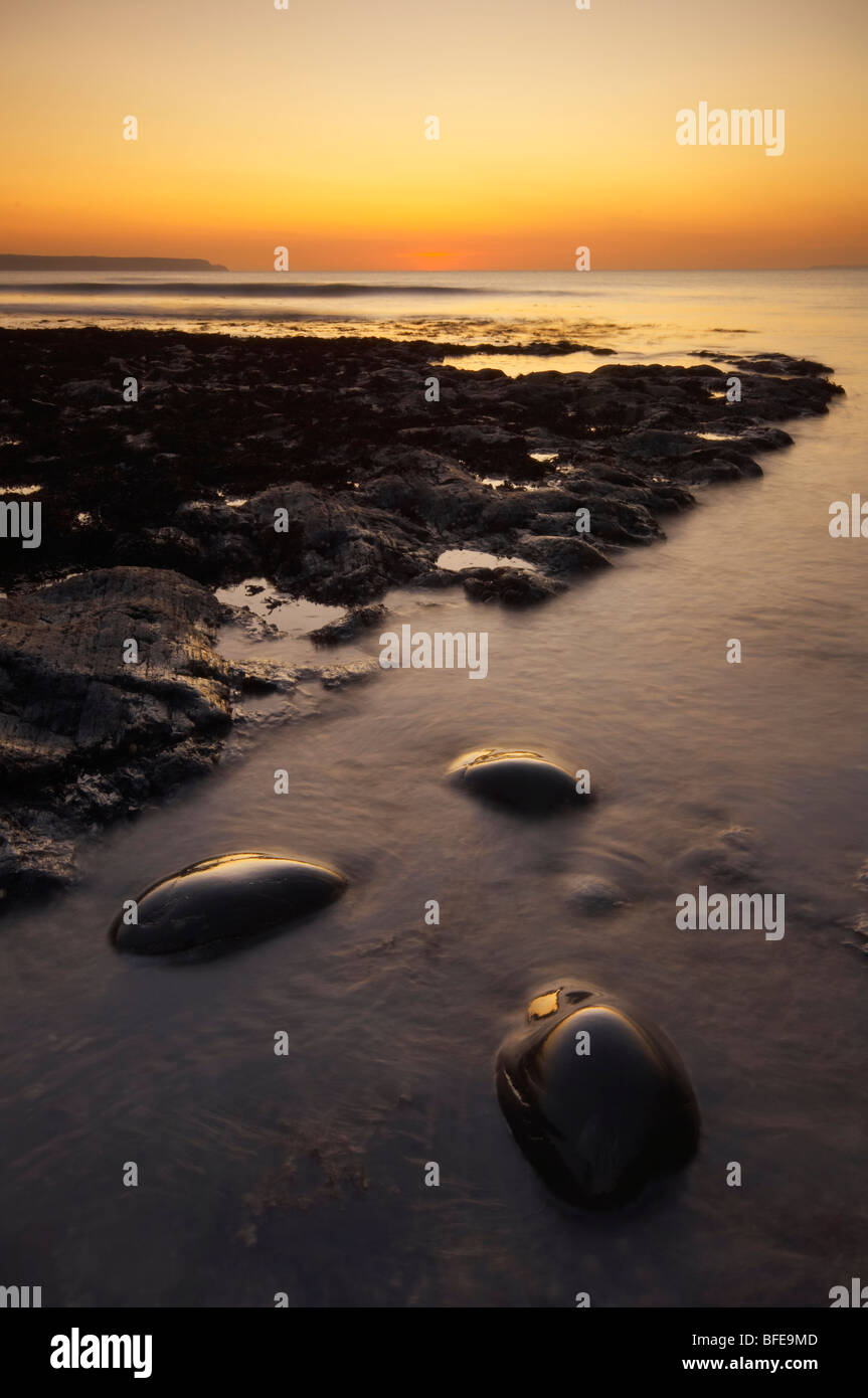 Sunset over Abbotsham beach on the North Devon coast UK Stock Photo - Alamy