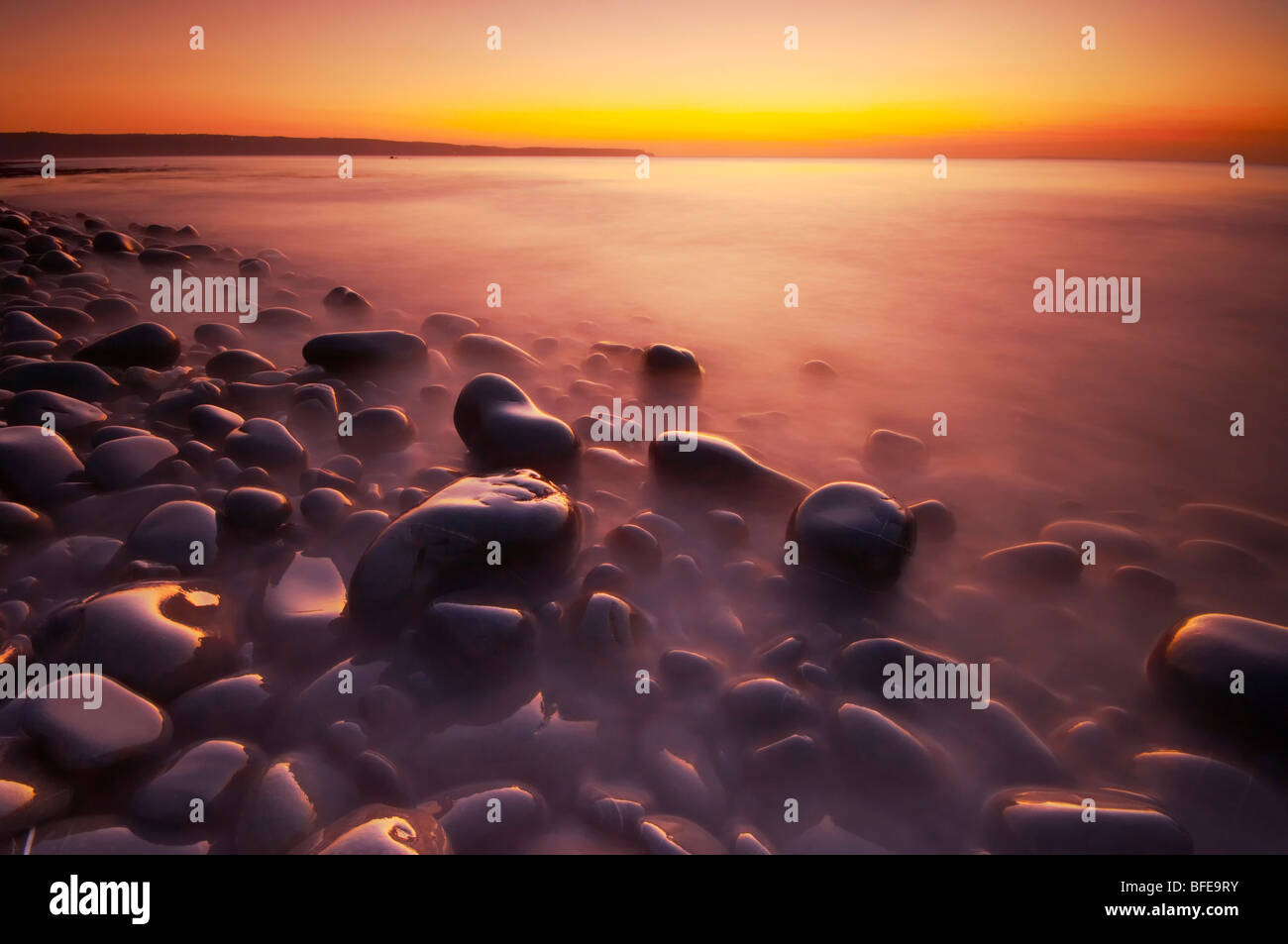 Sunset over Abbotsham beach on the North Devon coast UK Stock Photo - Alamy
