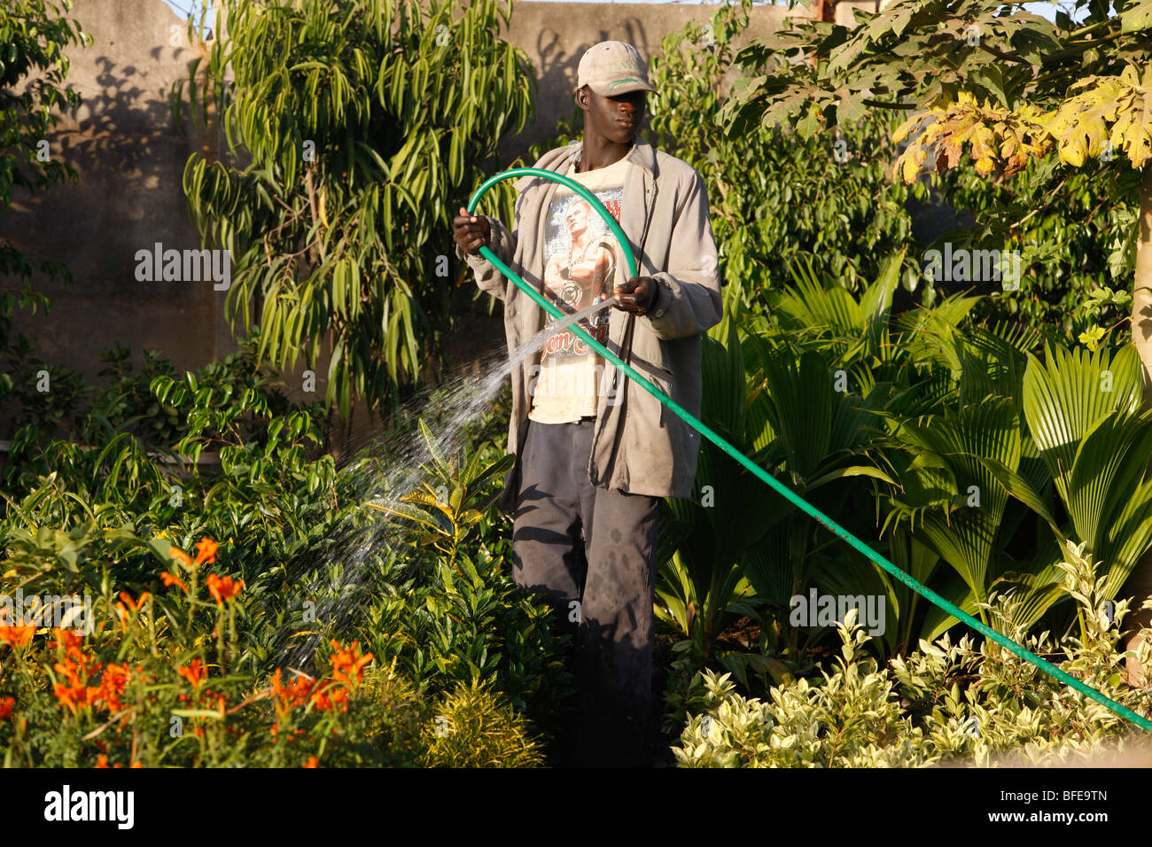 Watering garden africa hi-res stock photography and images - Alamy