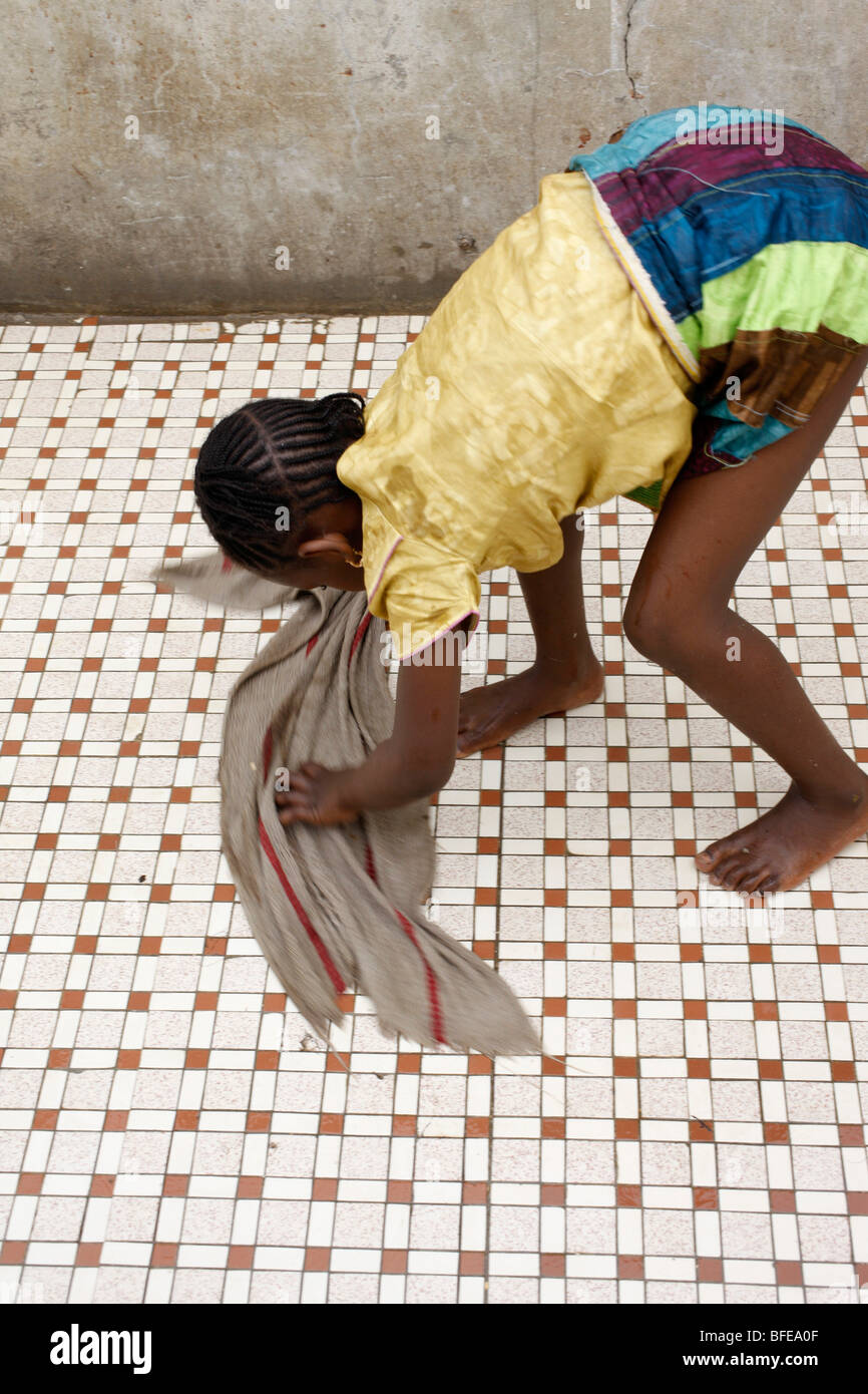 Sénégal Dakar Domestic servant washing a floor Stock Photo - Alamy