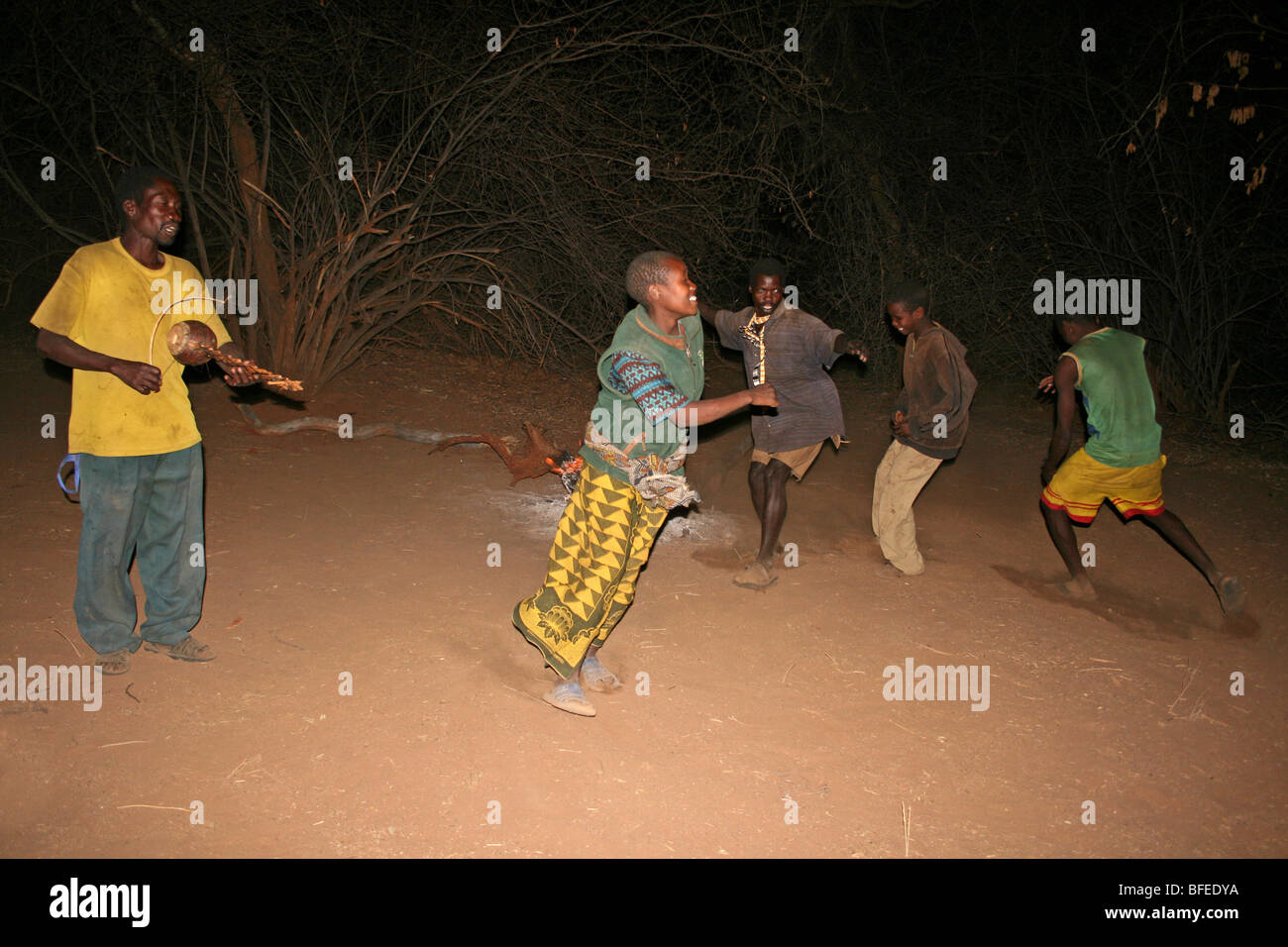 Hadza Tribe People Performing Traditional Dance Accompanied By A Zeze ...