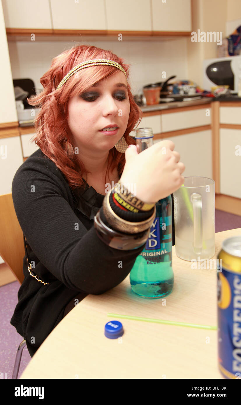 Teenage student girl getting drunk on alcoholpops and beer Stock Photo ...