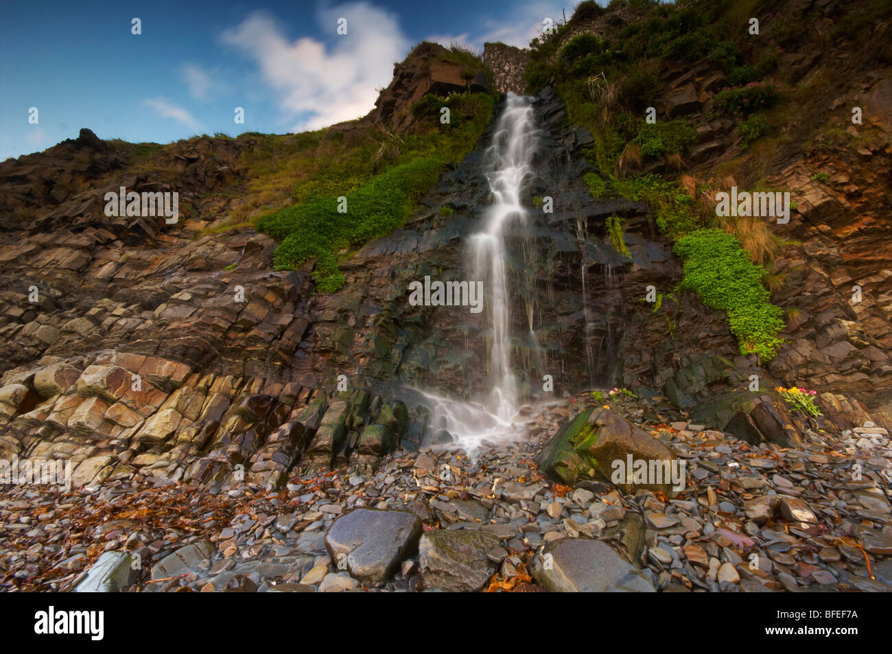 Bucks Mills waterfall cascading down over the beach on the North Devon ...