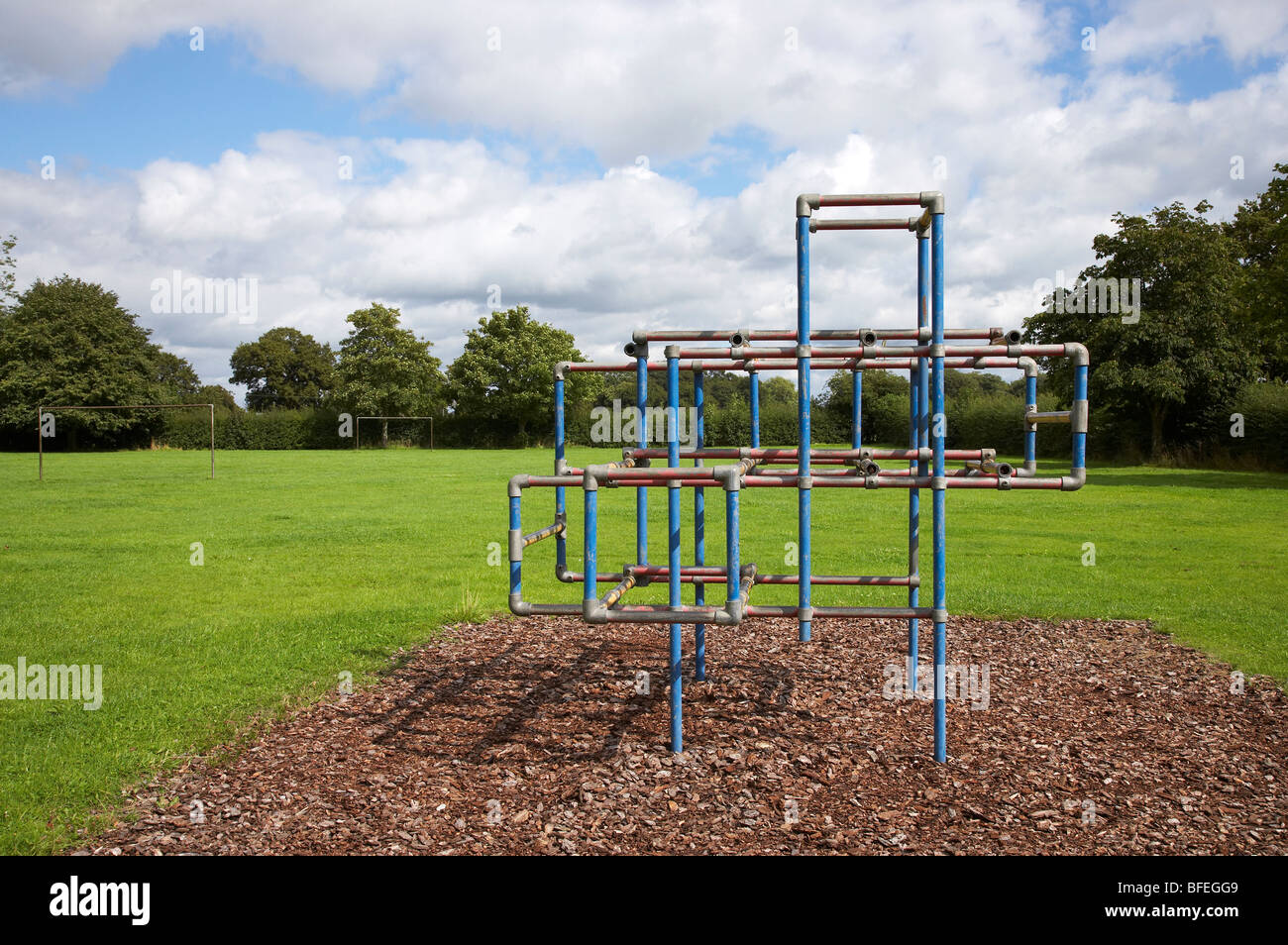 Climbing frame in playground Stock Photo - Alamy