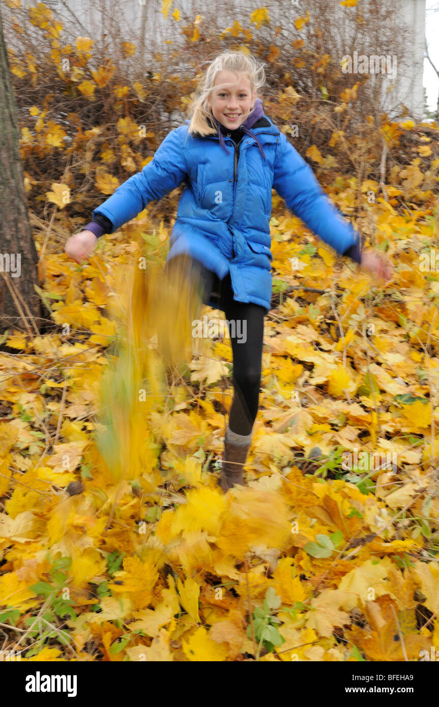 Young girl outside in the autumn Stock Photo - Alamy