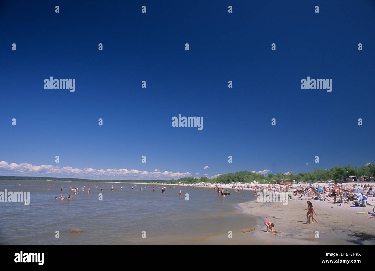 Swimming and sunbathing at Grand Beach, Lake Winnipeg, Manitoba, Canada ...