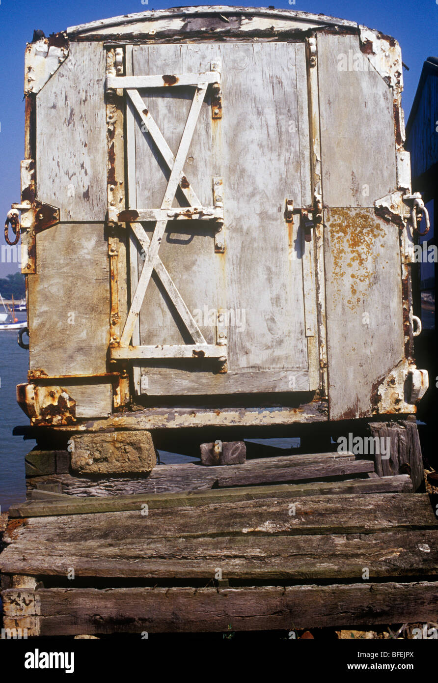Felixstowe Ferry Suffolk UK Old rusting shipping container converted ...