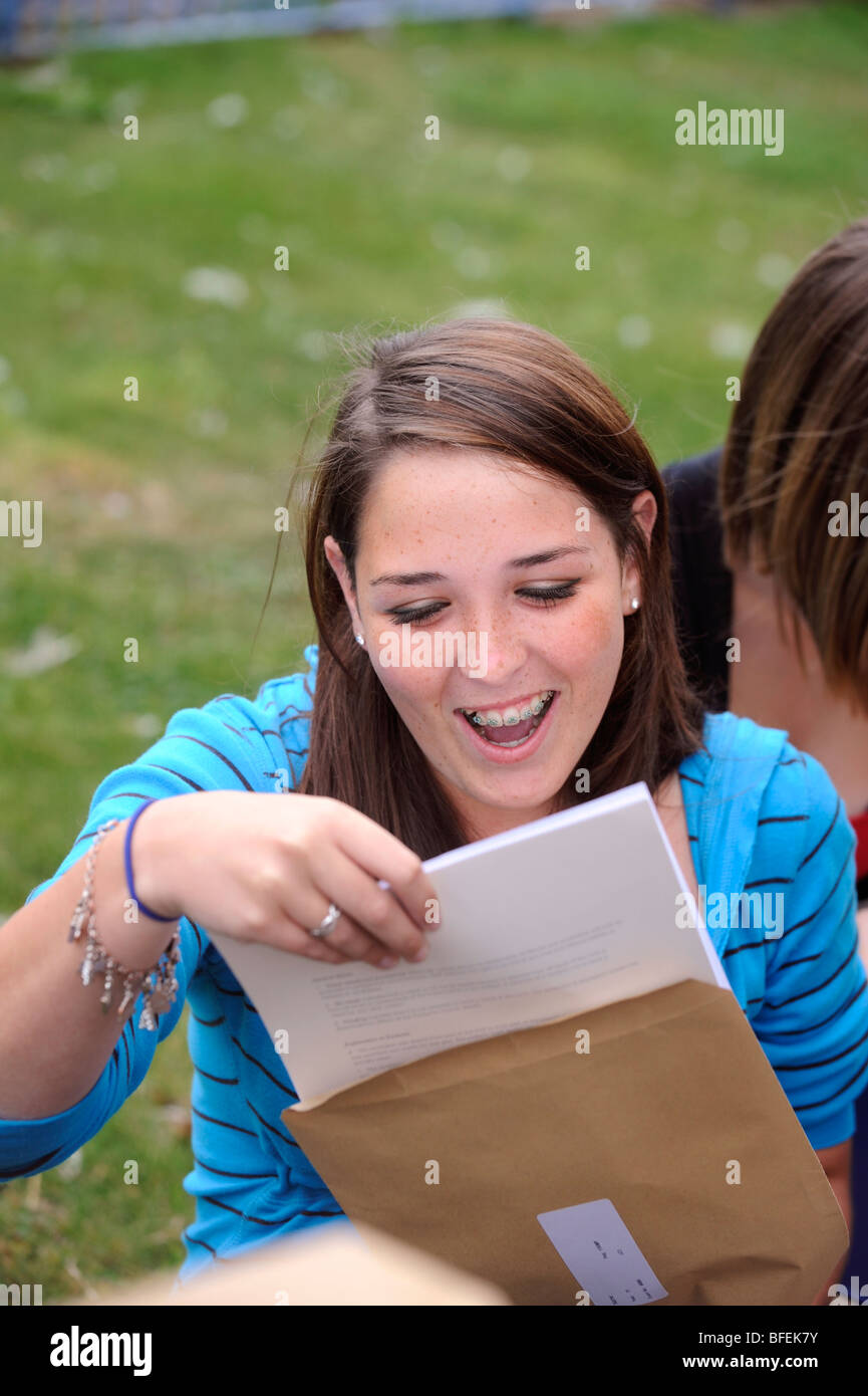Girl opening exam results hi-res stock photography and images - Alamy