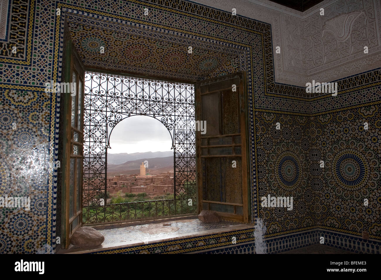A view of Telouet village through window of the Telouet kasbah. Telouet ...