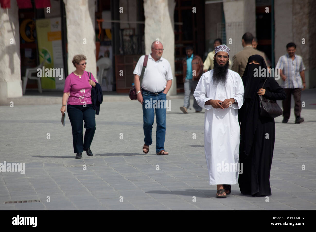 Tourist Couple and Muslim Couple in Souq Waqif in Doha Qatar Stock ...