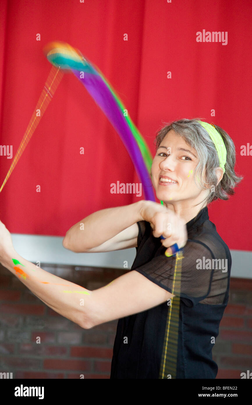 Circus Act - Portrait of Mature Woman performing wih Ribbons Stock ...