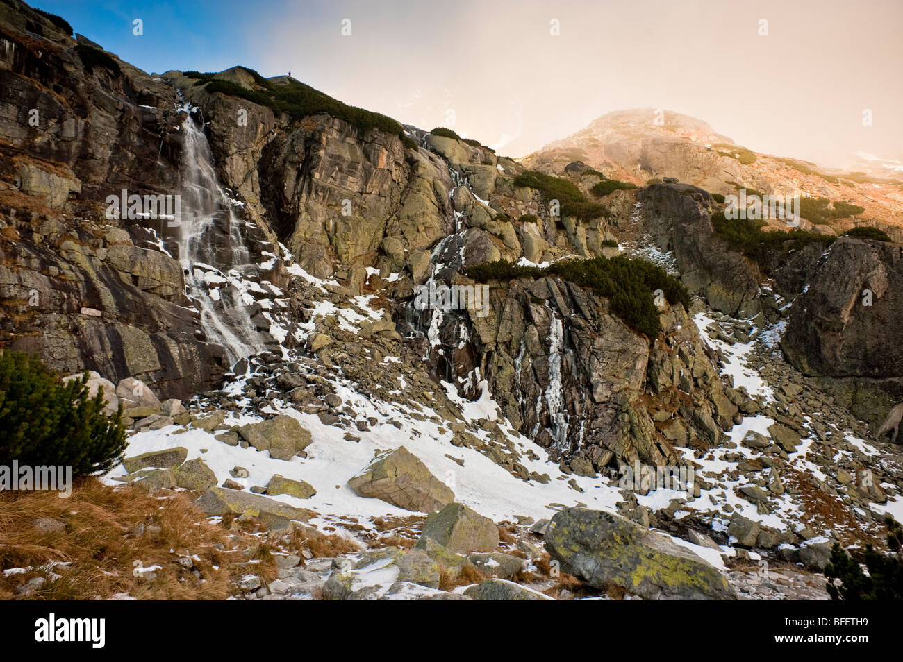 waterfall jump, mlynicka dolina, tatry, in evening light, late autumn ...