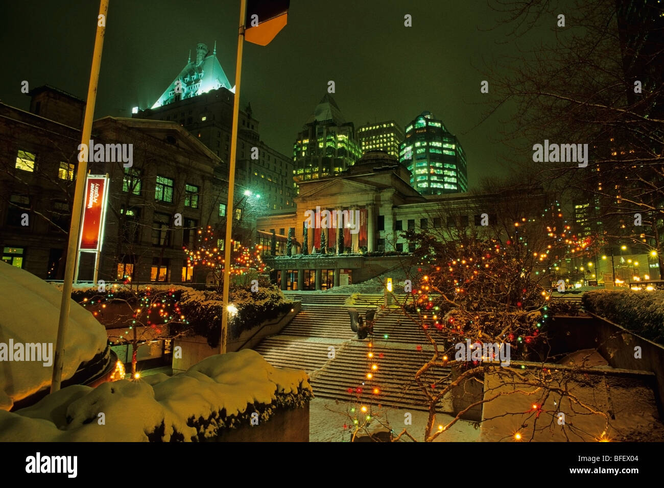 Robson Square, Art Gallery, and Hotel Vancouver at night in snow ...
