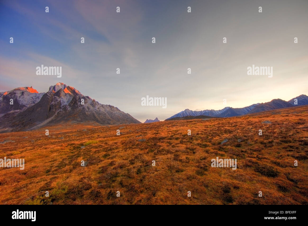 Last rays of sunlight hitting peak of Mount Monolith with Tombstone ...