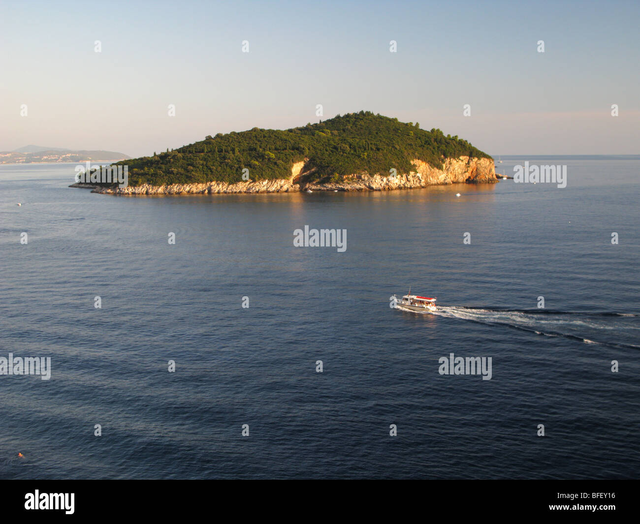 Lokrum Island near Dubrovnik Croatia and small motor boat Stock Photo ...