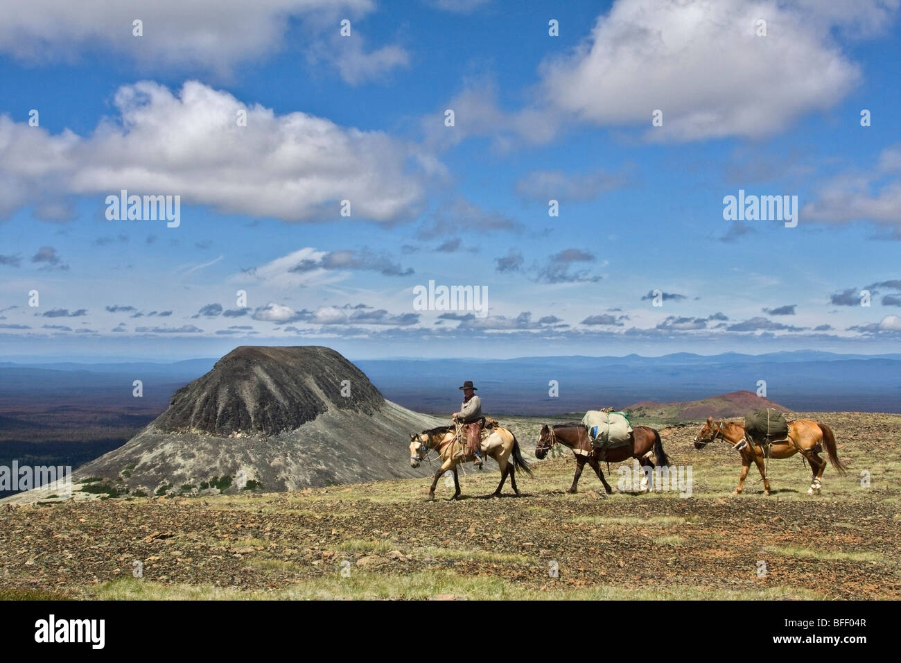 trail rider overlooking Volcanic cone in the Itcha Mountains in the ...