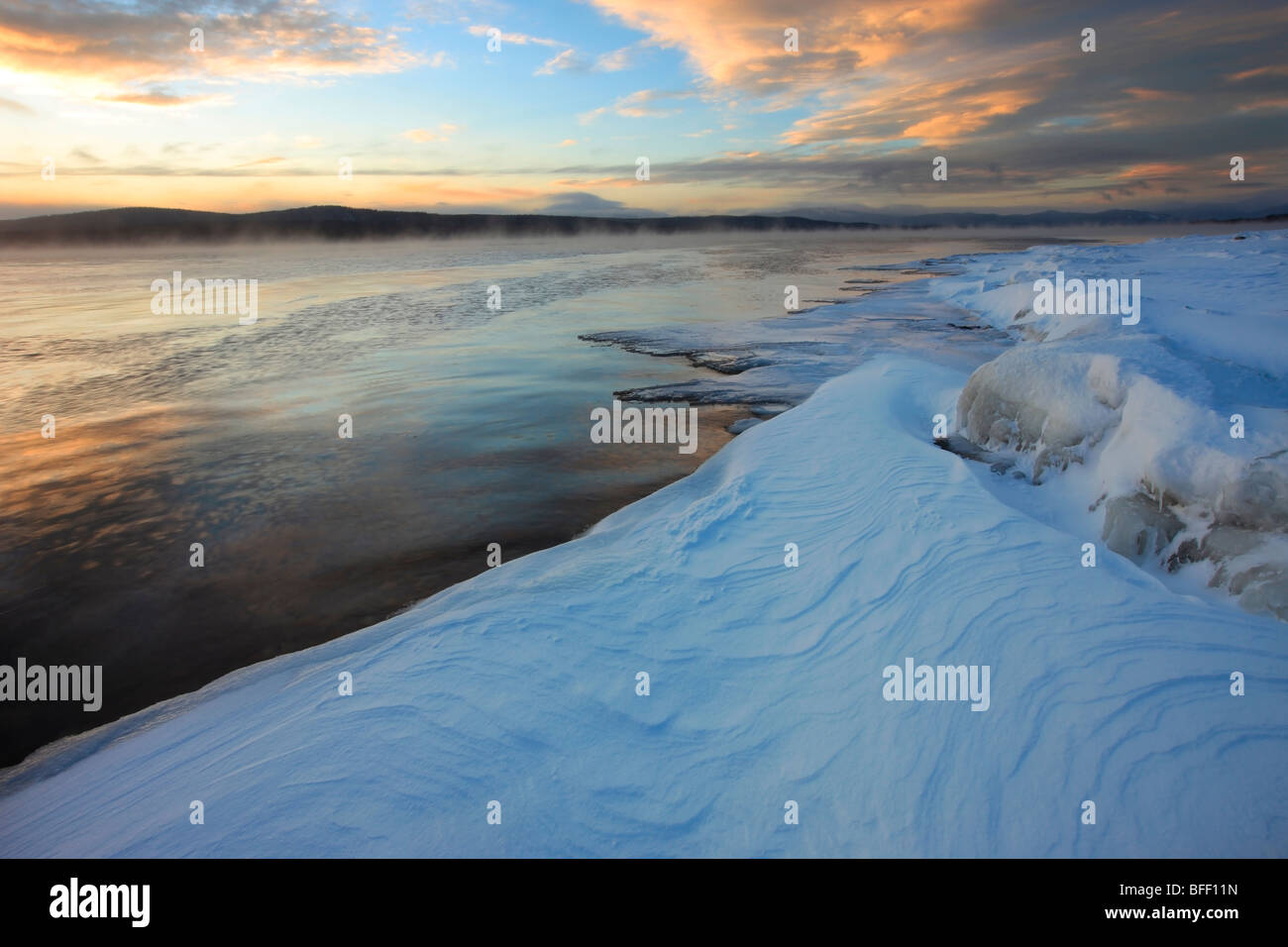 Sunset clouds over the icy shores of Teslin Lake, Teslin, Yukon Stock ...