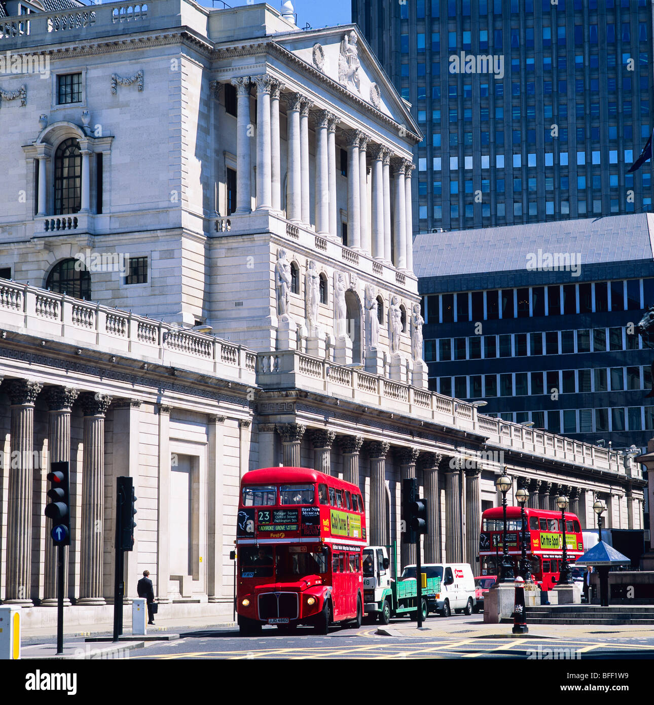 Bank of England and red double decker Routemaster buses City of London ...