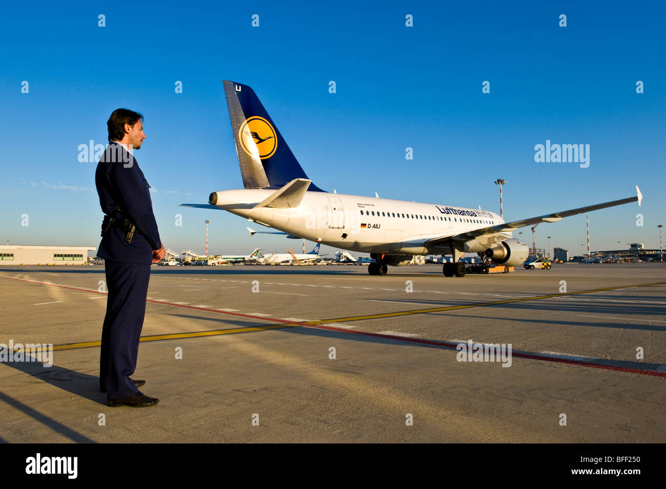 People waiting airport security check hi-res stock photography and images - Alamy