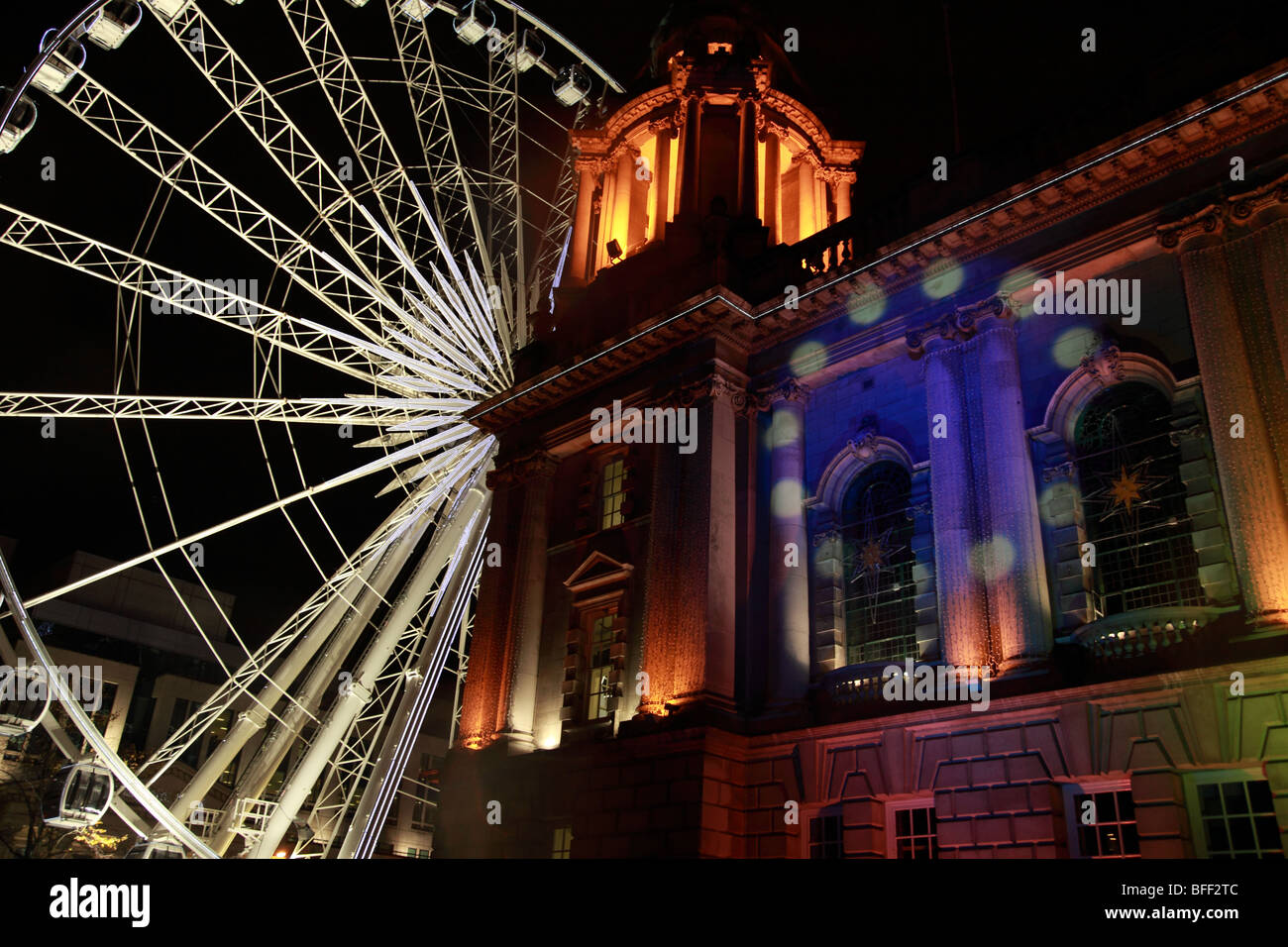 Belfast Wheel and City Hall at night Stock Photo - Alamy
