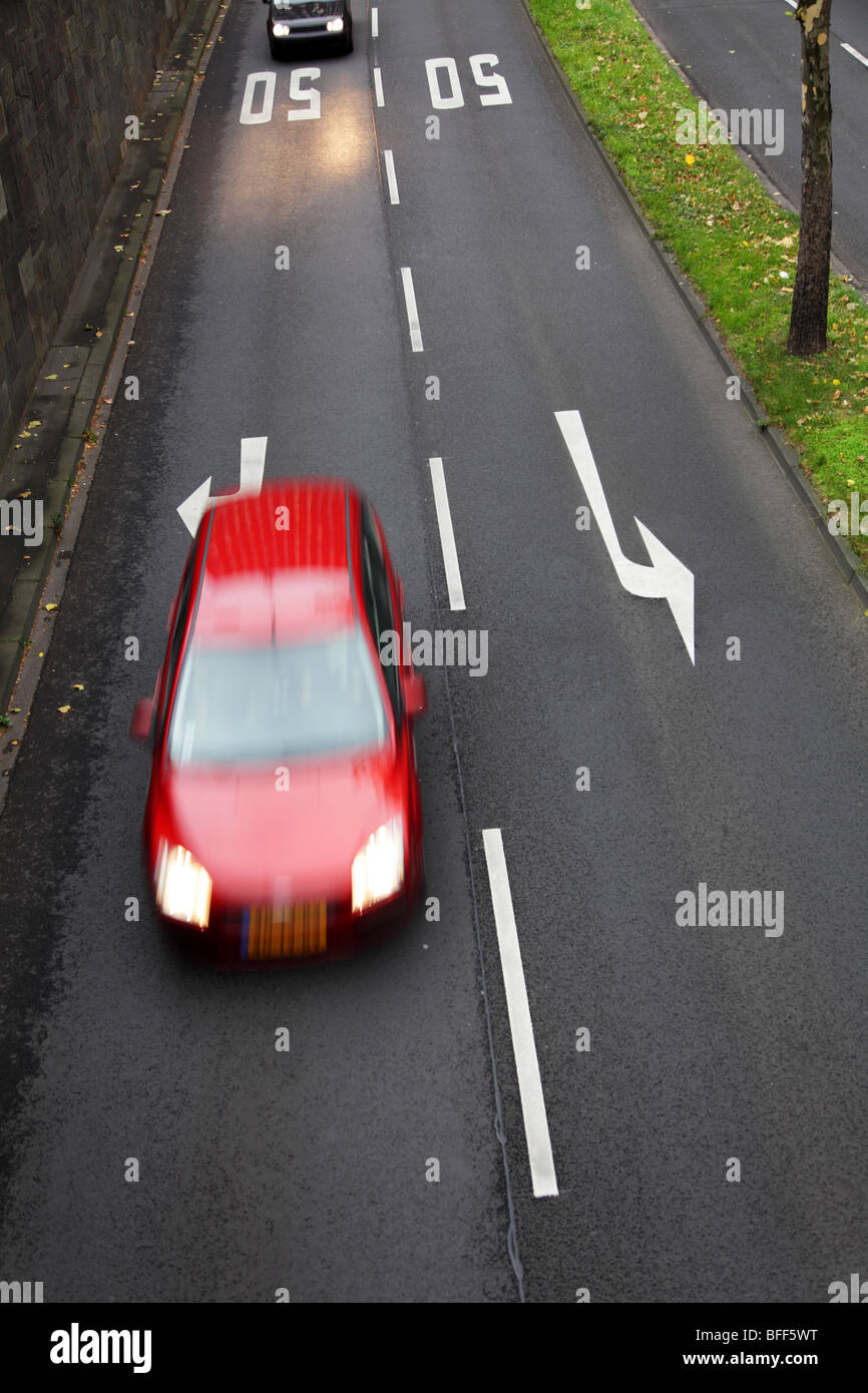 Car With Road Direction Arrows High Resolution Stock Photography and ...