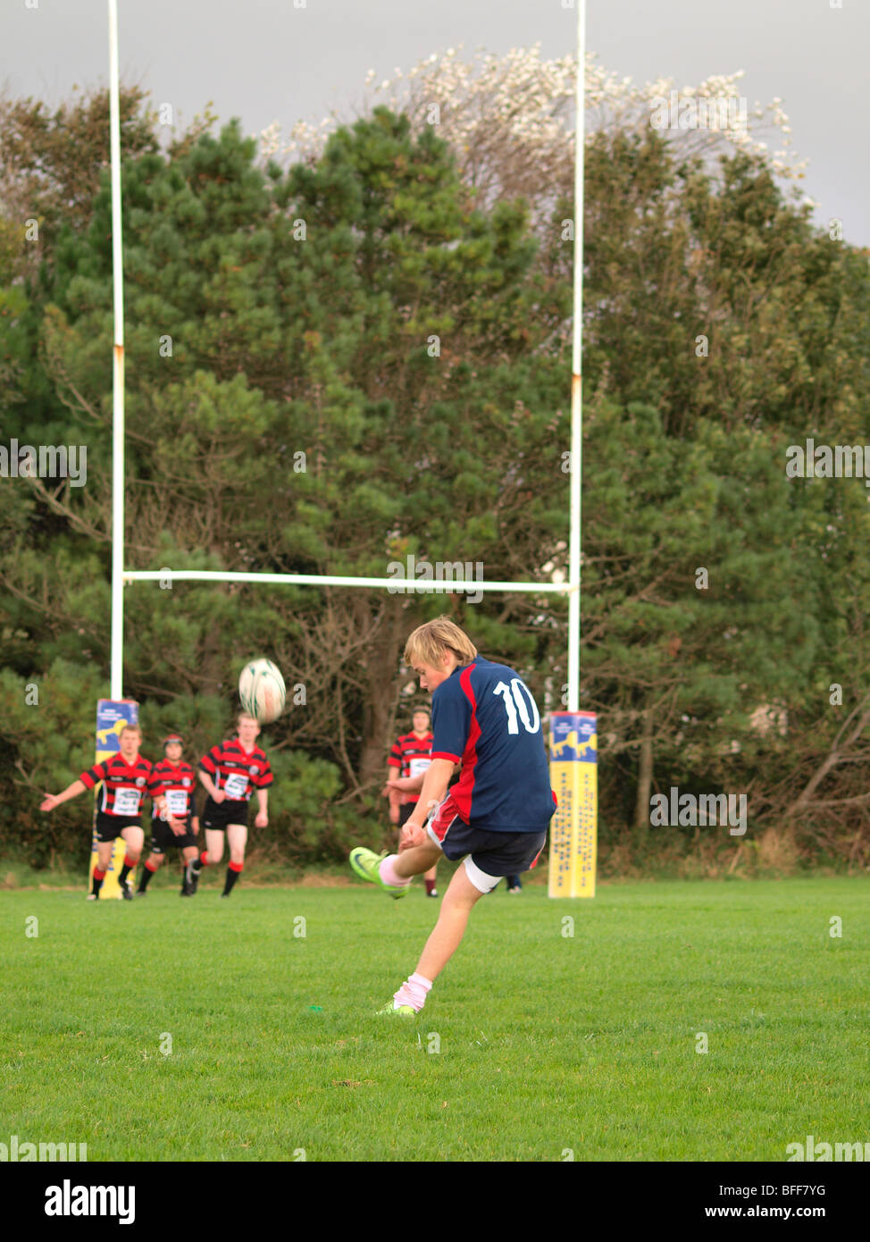 Teenage rugby player kicking a conversion, Bude, Cornwall Stock Photo ...