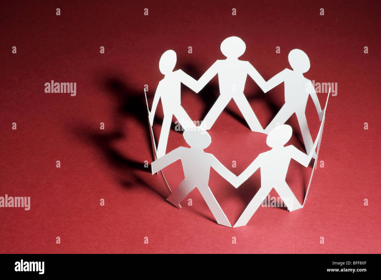 Paper Chain Dolls Stock Photo - Alamy