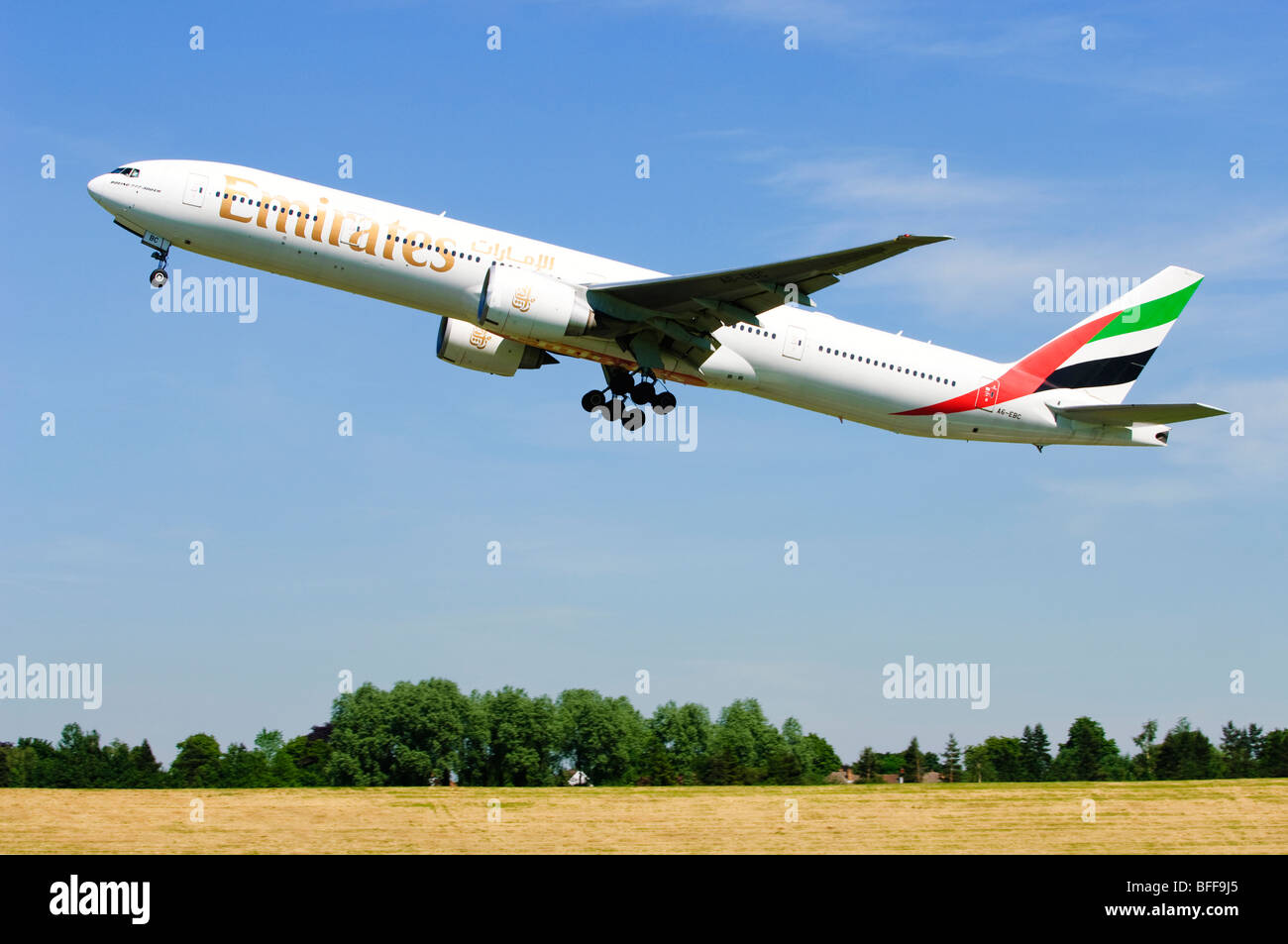 Boeing 777 operated by Emirates taking off from Birmingham Airport ...