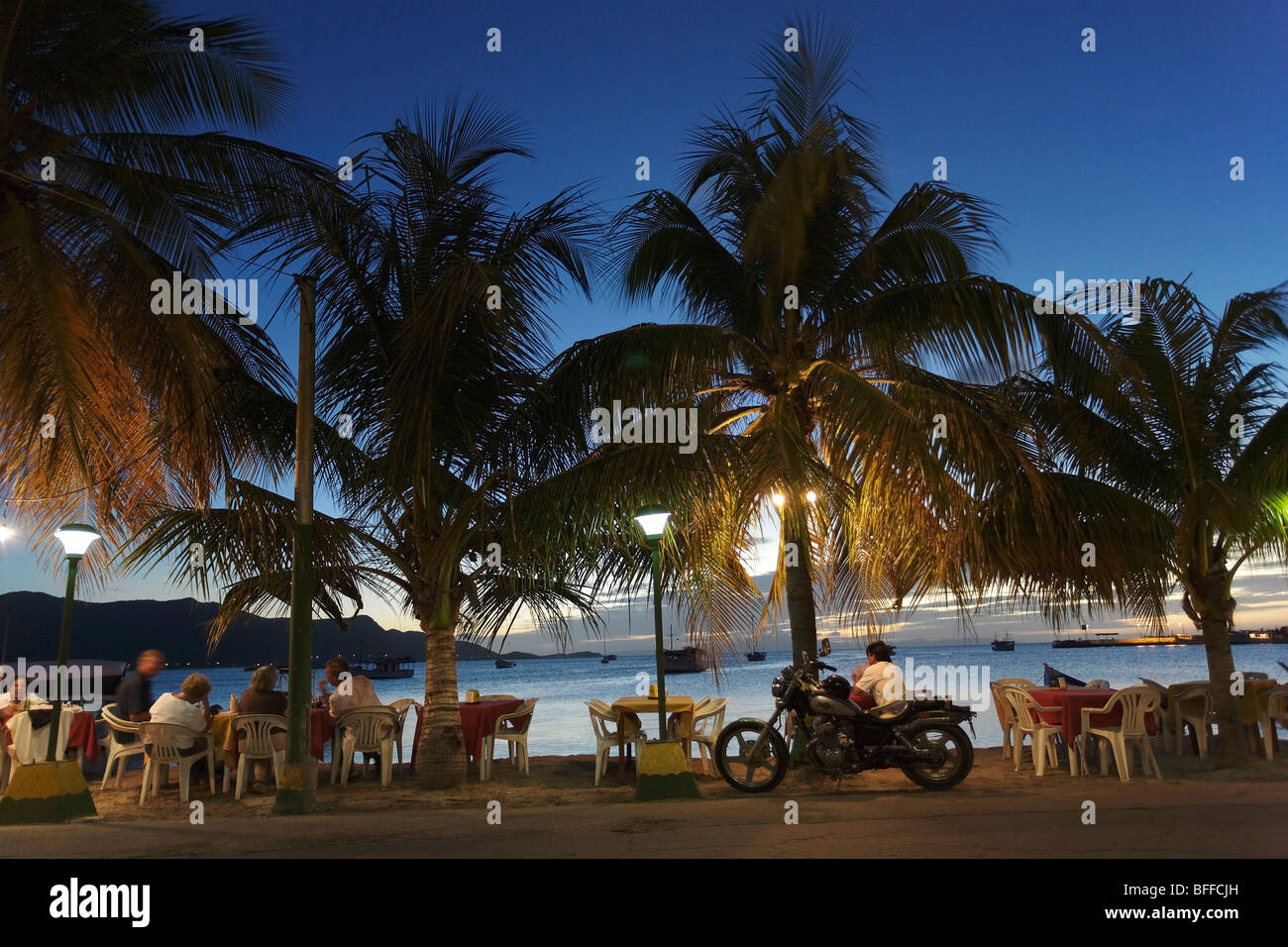 Beach bar at promenade in the evening, Juangriego, Isla Margarita ...