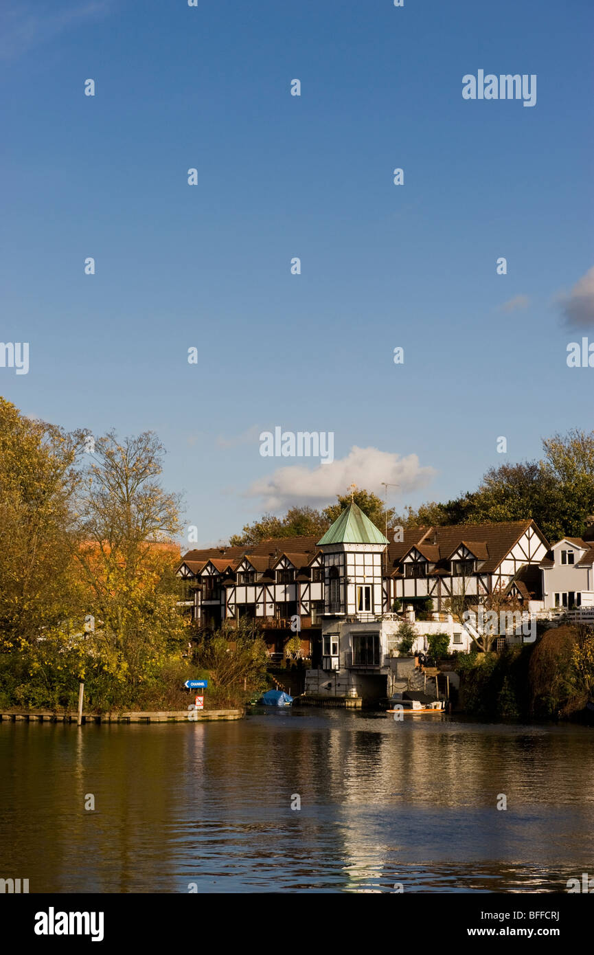 A traditional riverside timbered building by the River Thames at ...