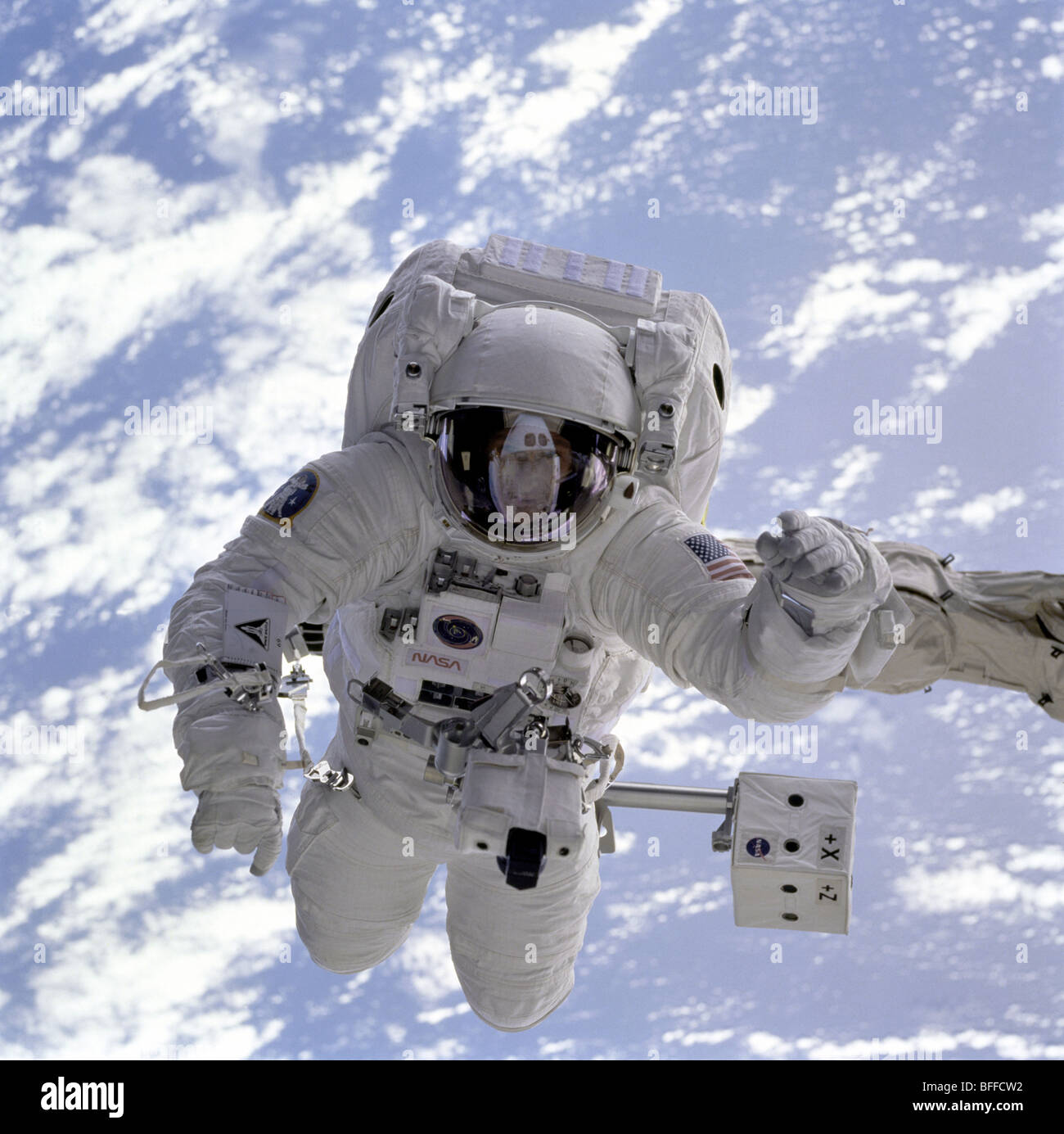 NASA Astronaut Michael Gernhardt attached to shuttle robot arm Stock ...