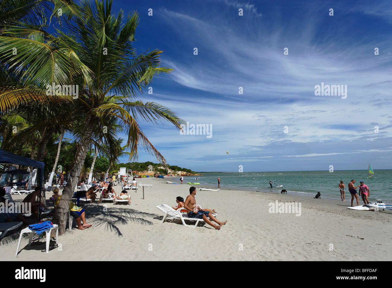 Tourists sunbathing at Playa El Yaque, Isla Margarita, Nueva Esparta ...
