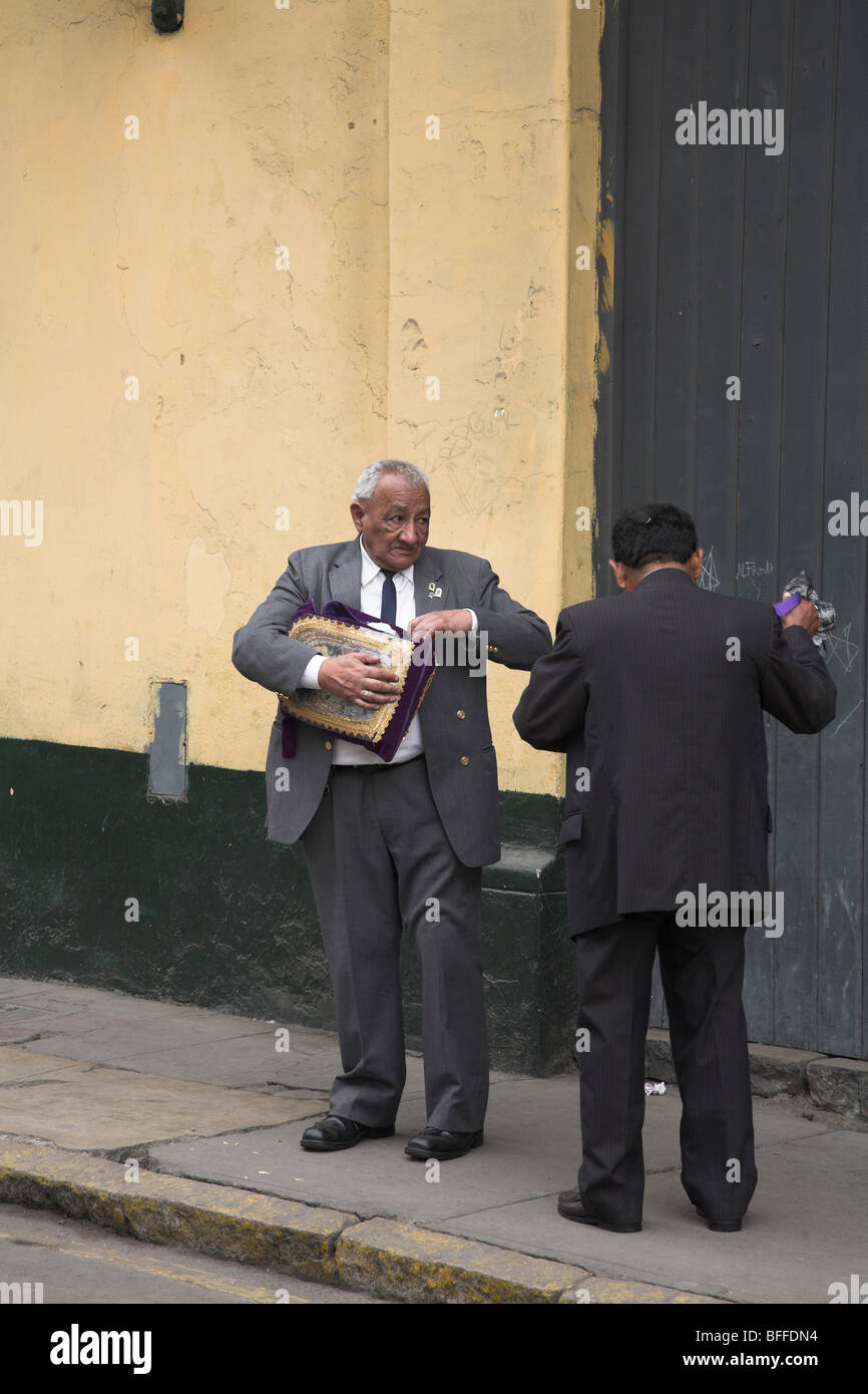 Lima, Peru, street nearby Plaza de Armas or Plaza Mayor: men in a ...