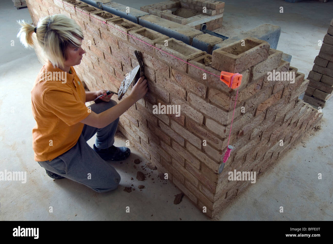 Bricklayer building wall hi-res stock photography and images - Alamy