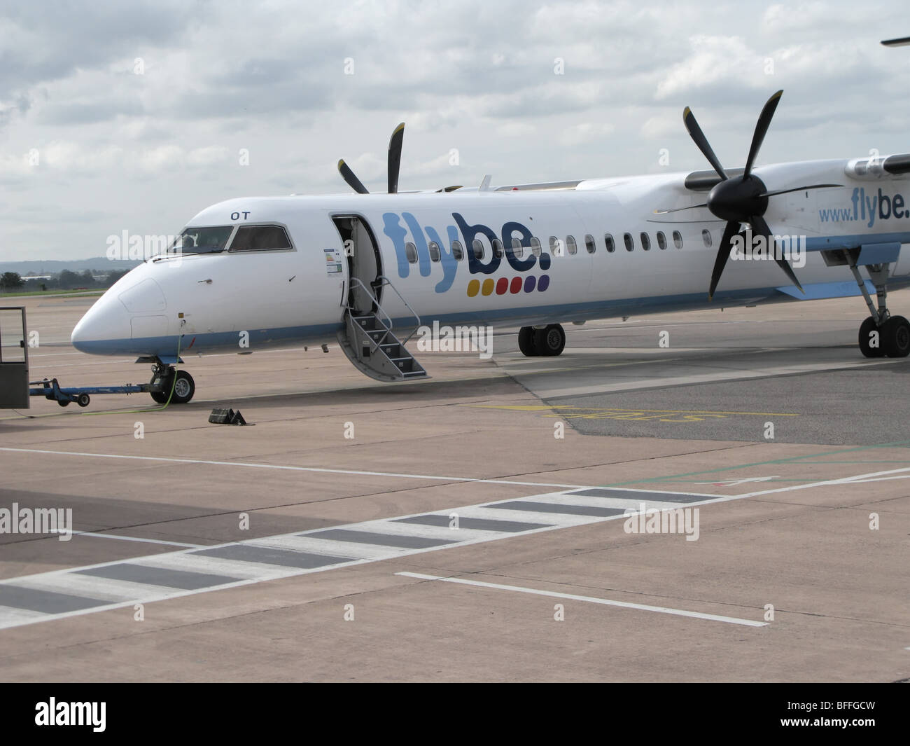Flybe de Havilland Dash 8 dhc-8 twin-turboprop airliner on the runway ...