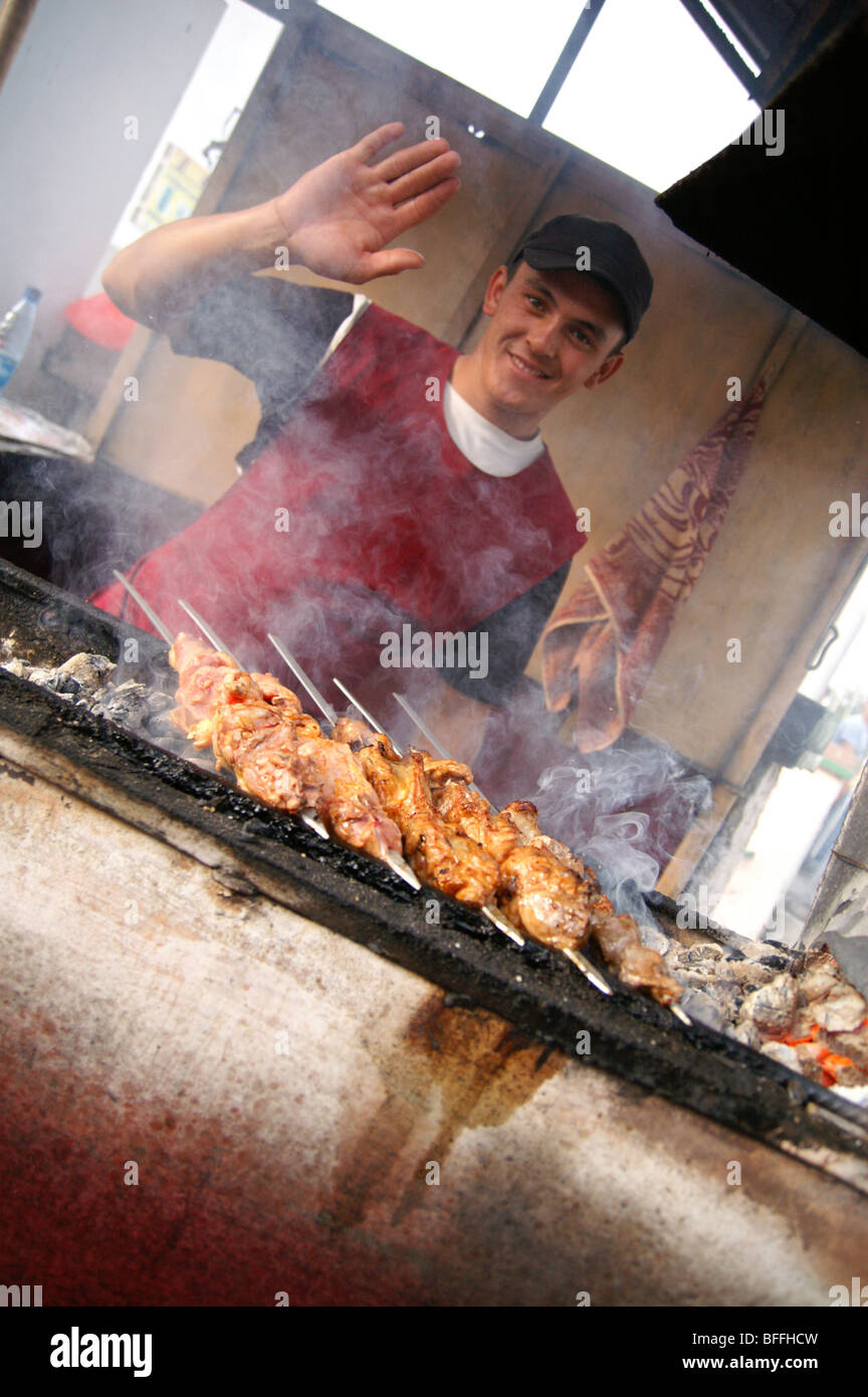 Uzbek immigrant sells kebabs in a bazaar in Semei (Semipalatinsk ...