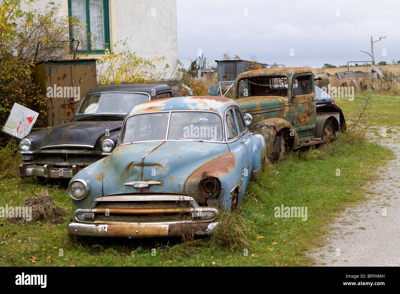 Old american rust car in junkyard Stock Photo - Alamy