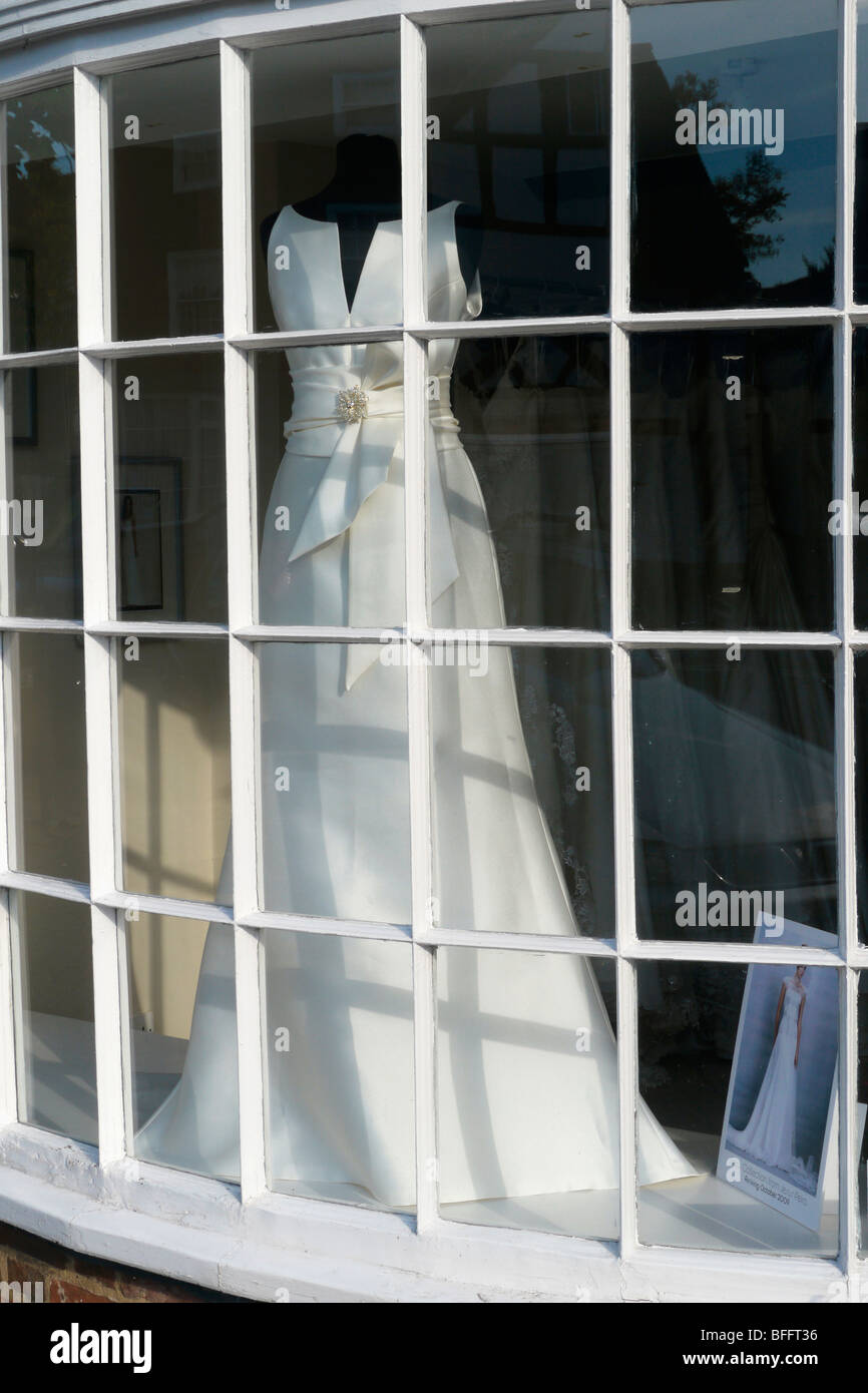 wedding dress in shop window Stock Photo - Alamy