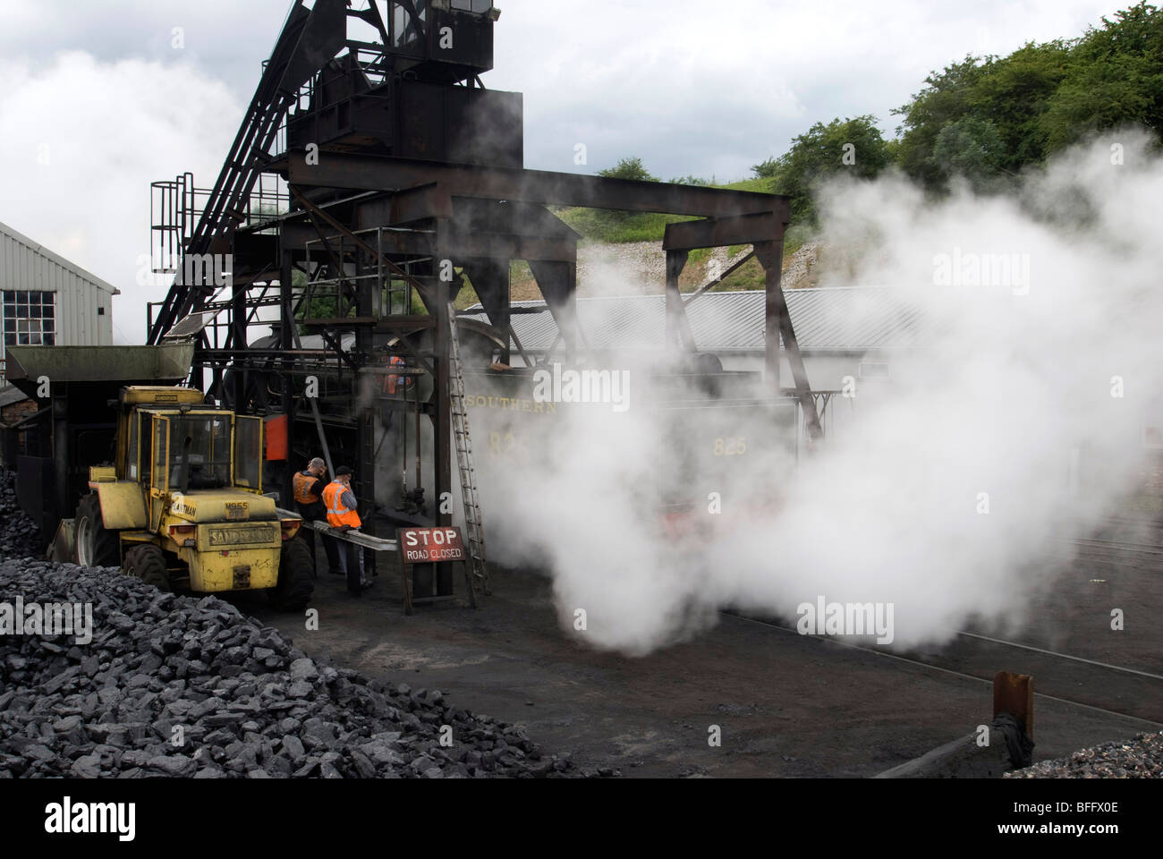 Steam locomotive letting off steam in the refuelling/decommissioning ...